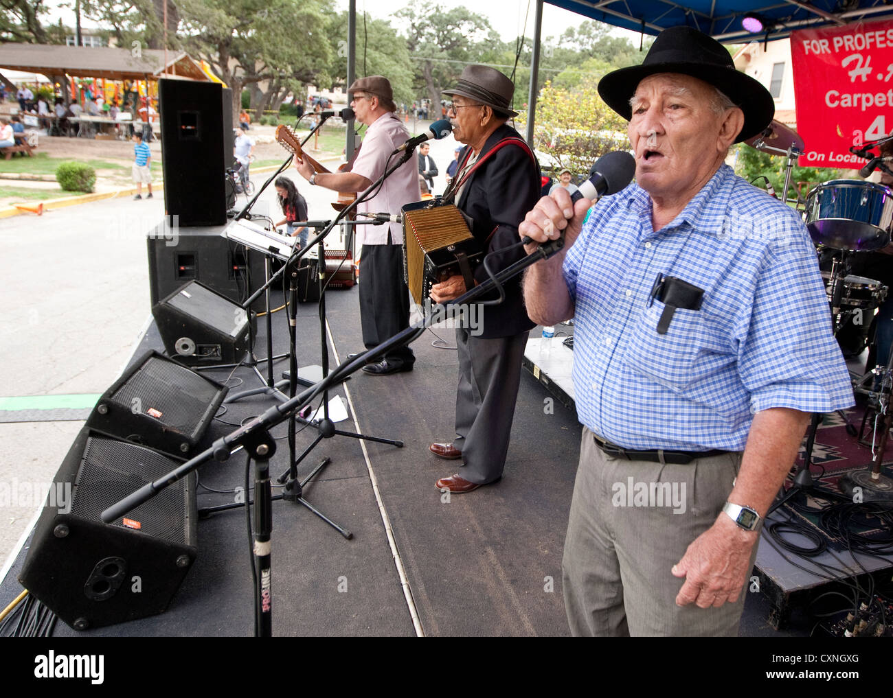 Tejano style music group including young white male, senior Mexican ...