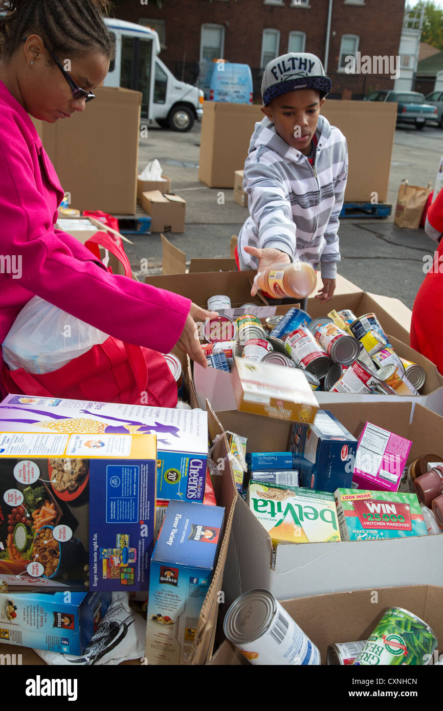 Volunteers Sort and Pack Food Donated for Food Banks and Soup Kitchens ...