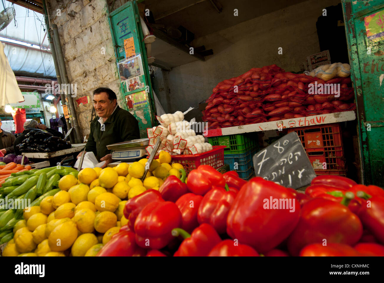 Israel, Jerusalem, vegetable vendor at Mahane Yehuda Market or Shuk ...