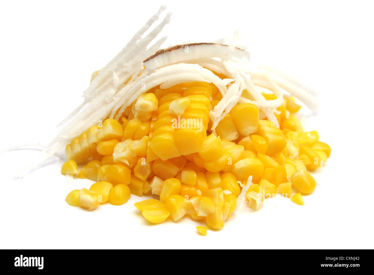 Corn with sliced coconut on white background Stock Photo - Alamy