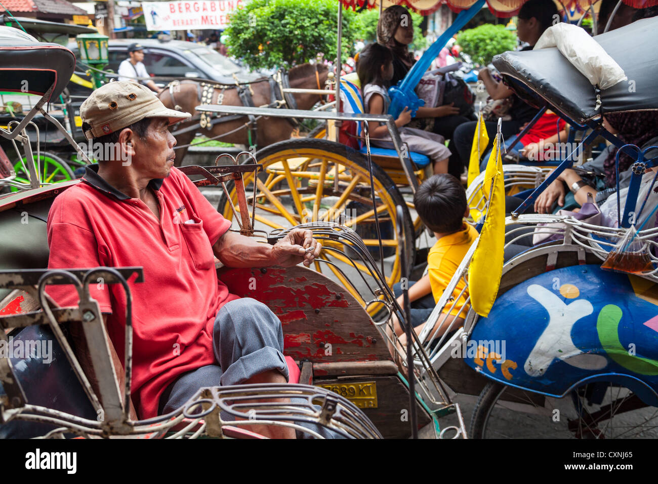Rickshaw Driver in Yogyakarta in Indonesia Stock Photo - Alamy