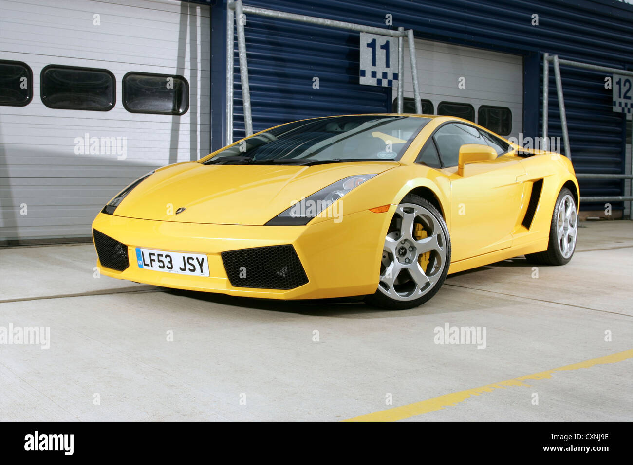 Front 3/4 Lamborghini Gallardo parked in pit lane Stock Photo - Alamy