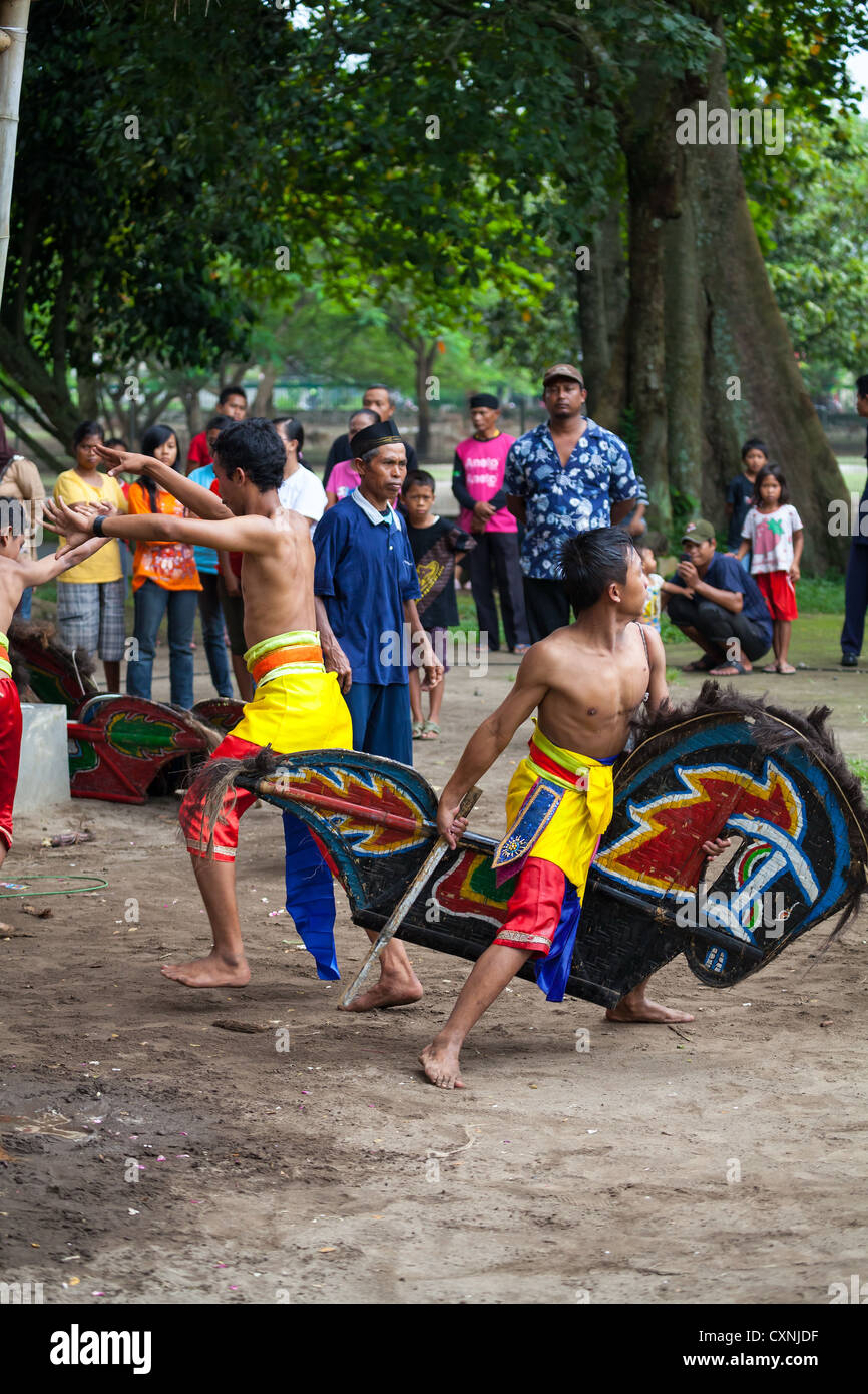 Traditional Folk Dancers in the Garden of the Temple Park of Prambanan ...