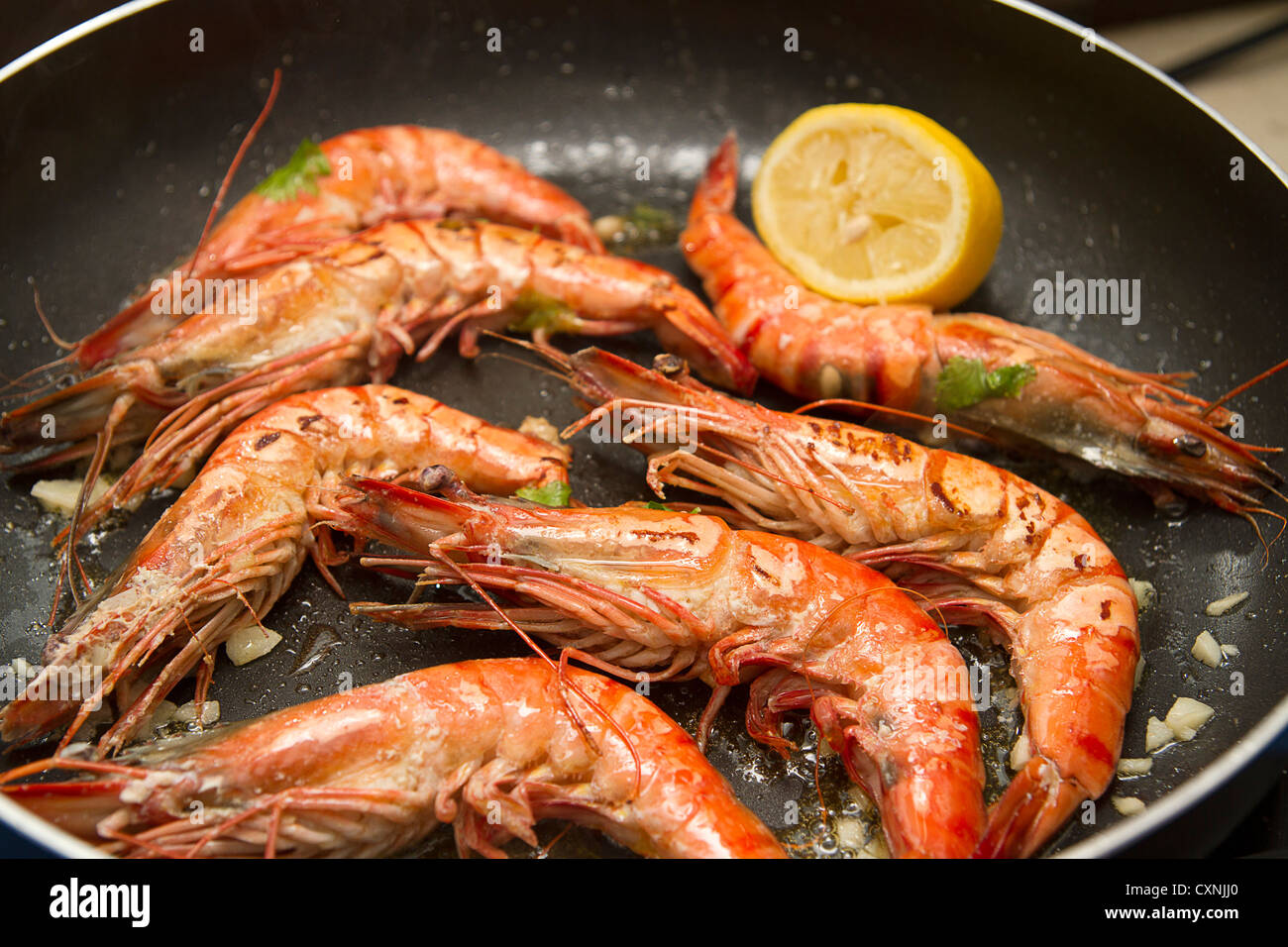 Fresh tiger prawns in a pan Stock Photo - Alamy