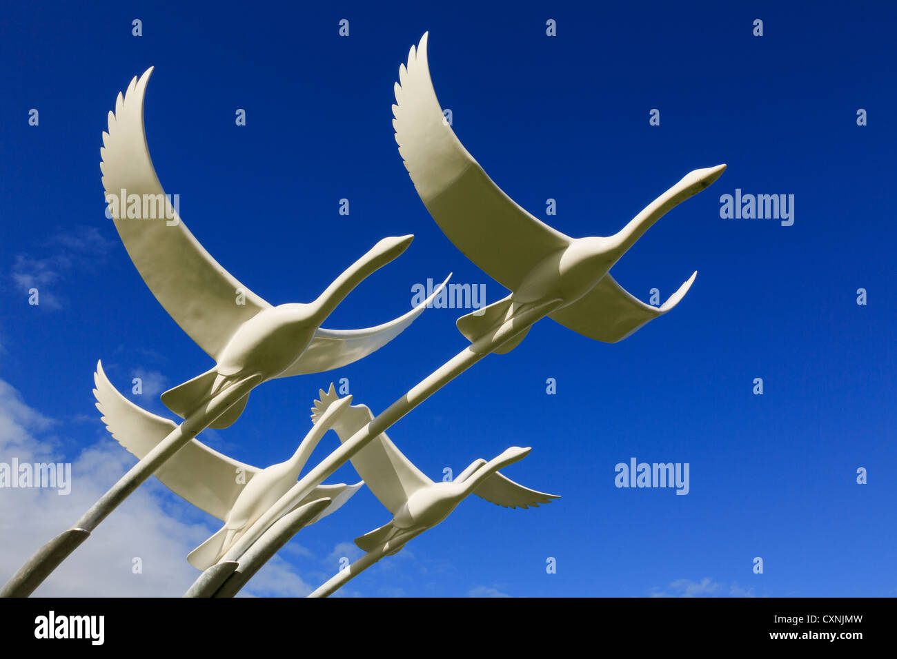 Four Swans sculpture from the Children of Lir legend against blue sky ...