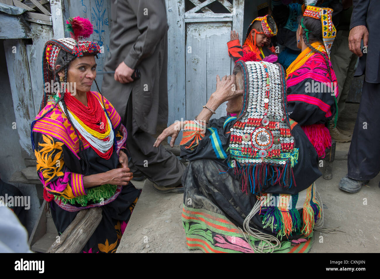 Kalash women talking at the Anish Brun Village Charso (dancing ground ...