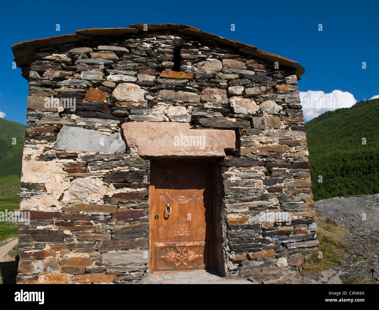 Stone church building in Ushguli village Stock Photo - Alamy