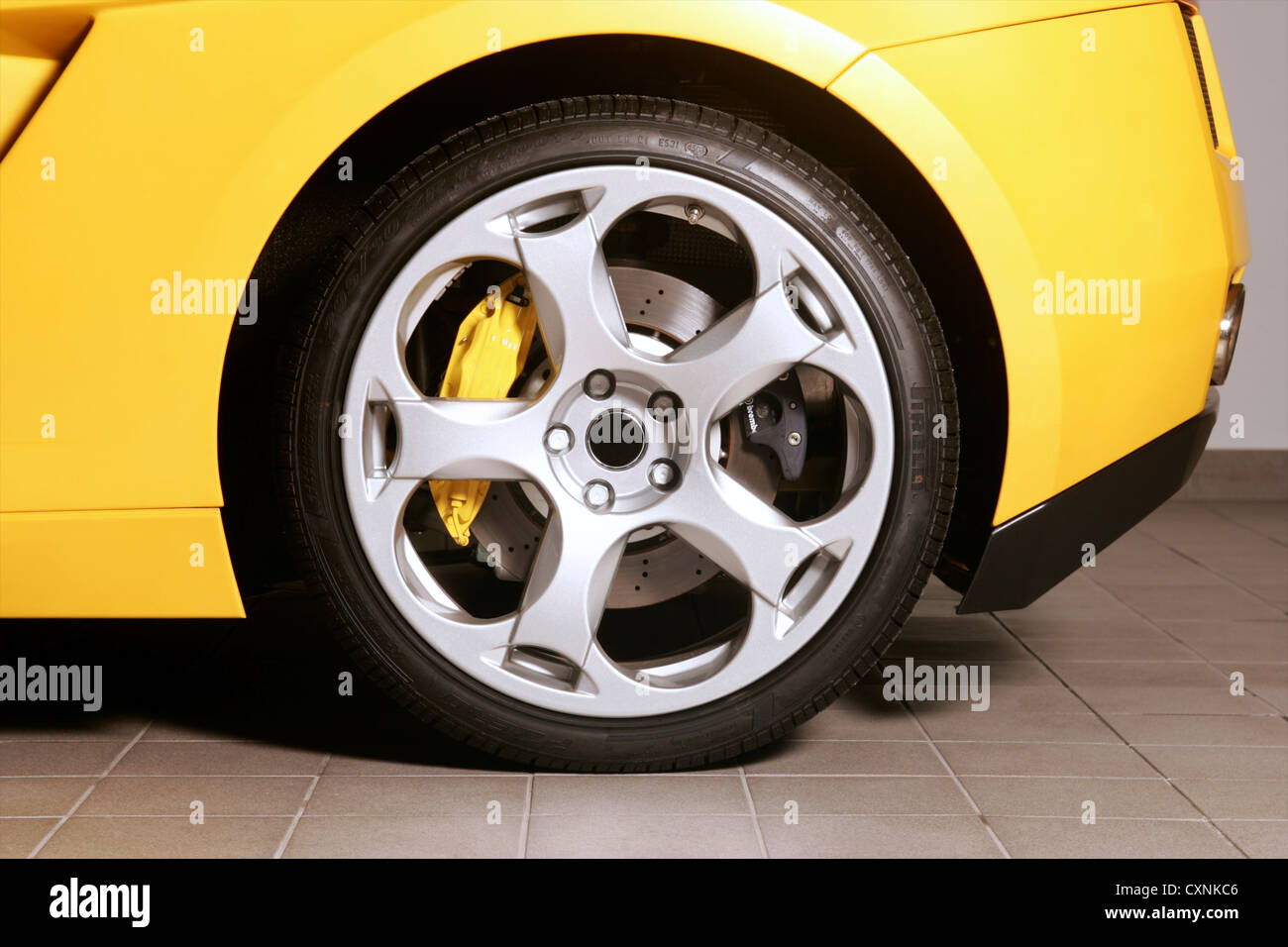 Super car rear wheel, caliper and disk Stock Photo - Alamy