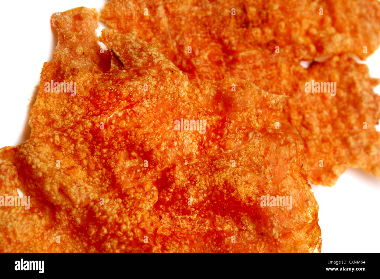 Chinese sliced sheets of dried and crispy pork on white background ...