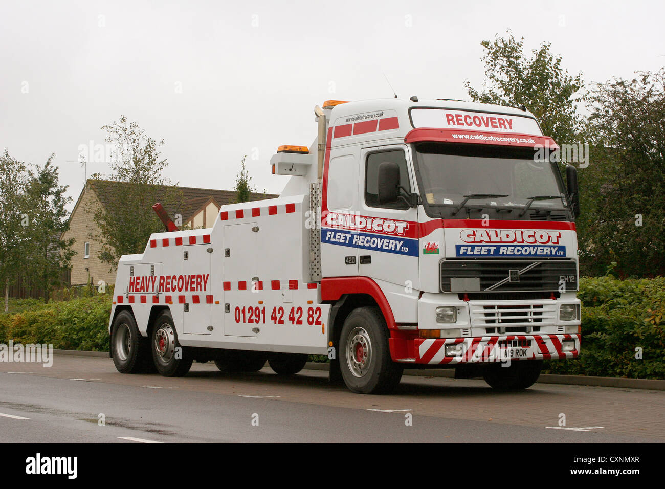 Heavy fleet recovery truck parked in a superstore car park filling many ...