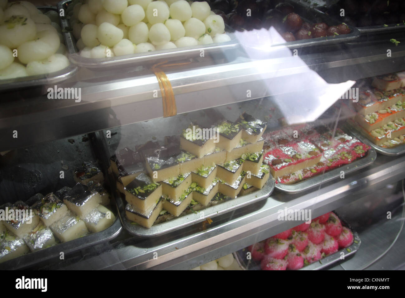 Indian sweets display in Indian sweet shop Stock Photo - Alamy Indian sweets display in Indian sweet shop Stock Photo - Alamy