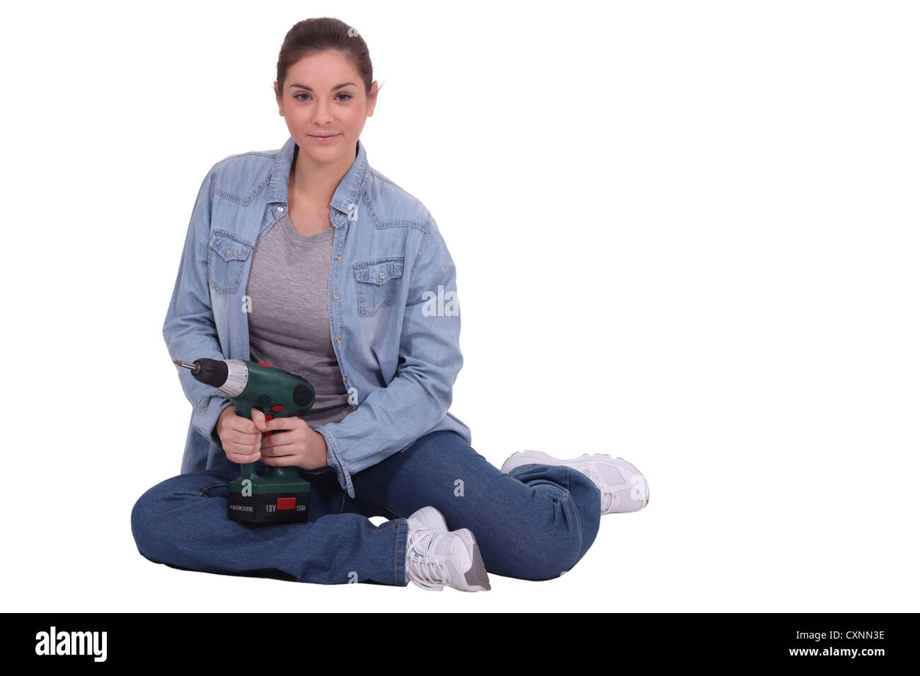 Woman with drill Stock Photo - Alamy