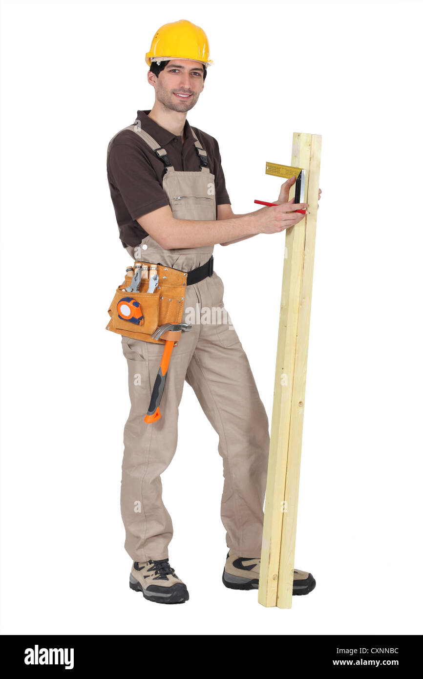 Carpenter marking wood Stock Photo - Alamy