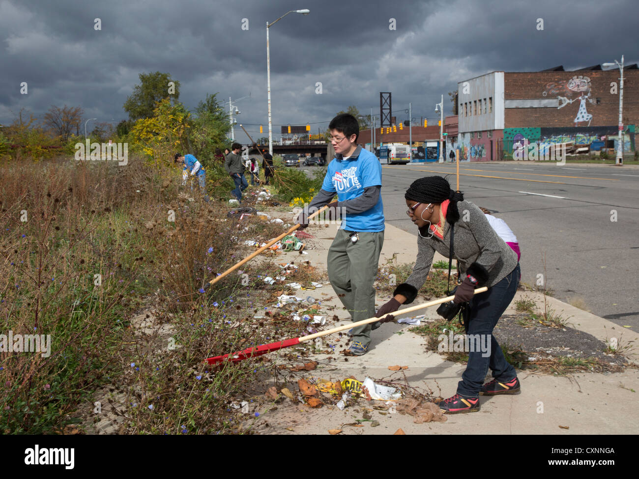 Volunteers Clean Trash and Weeds from Detroit Street Stock Photo - Alamy