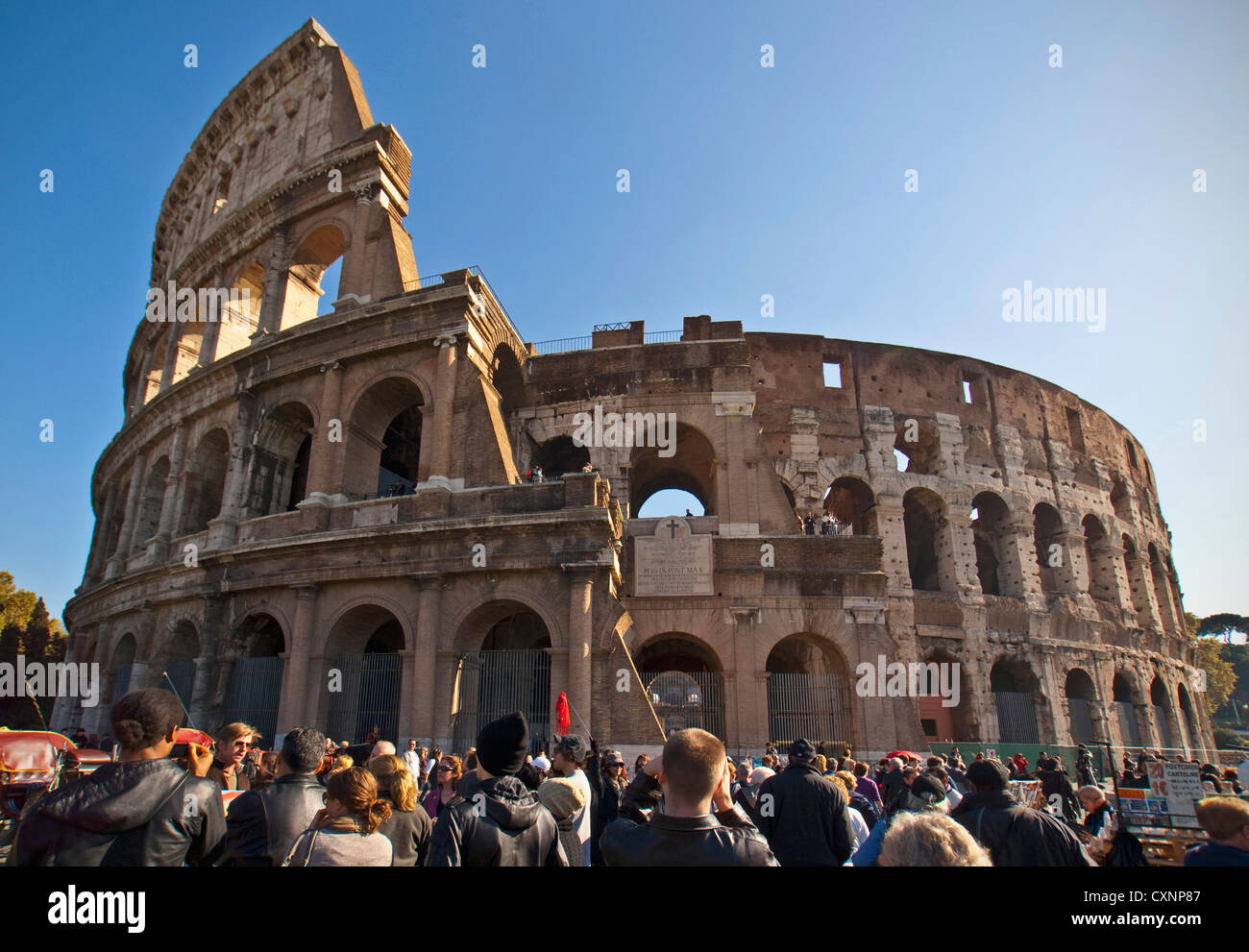 The Colosseum in Rome with tourists Stock Photo - Alamy