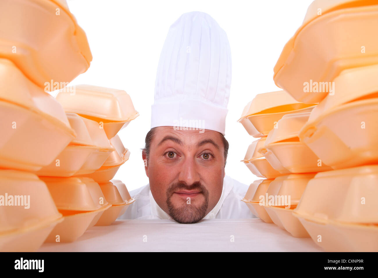 cook with stacks of packagings Stock Photo - Alamy