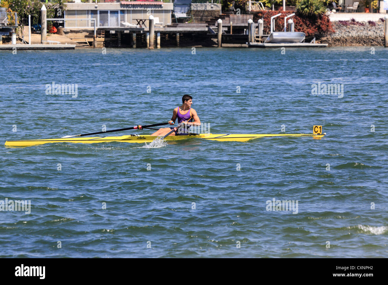 single rower at University river regatta rowing for trophies Surfers ...