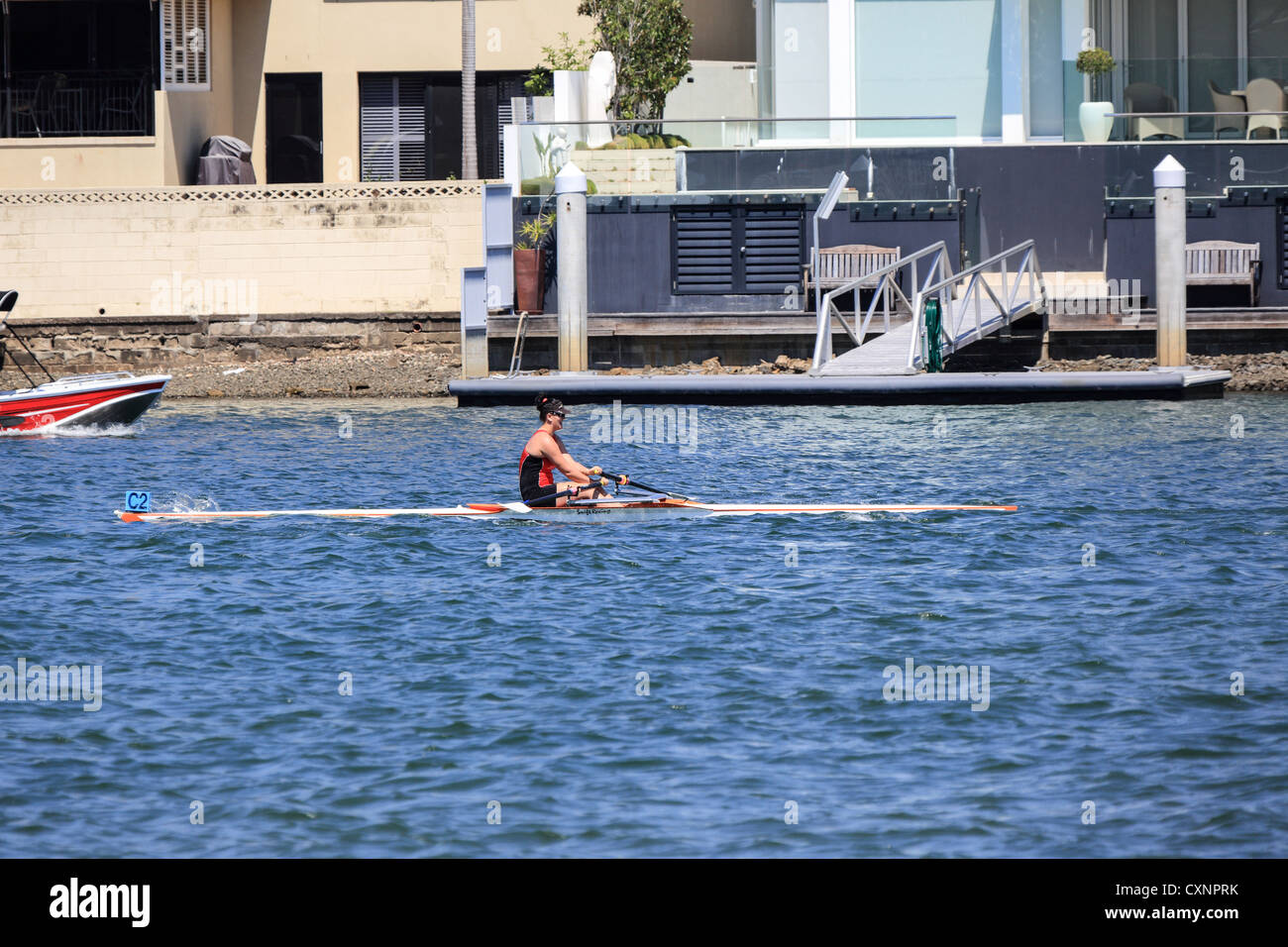 single rowers at University river regatta rowing for trophies Surfers ...