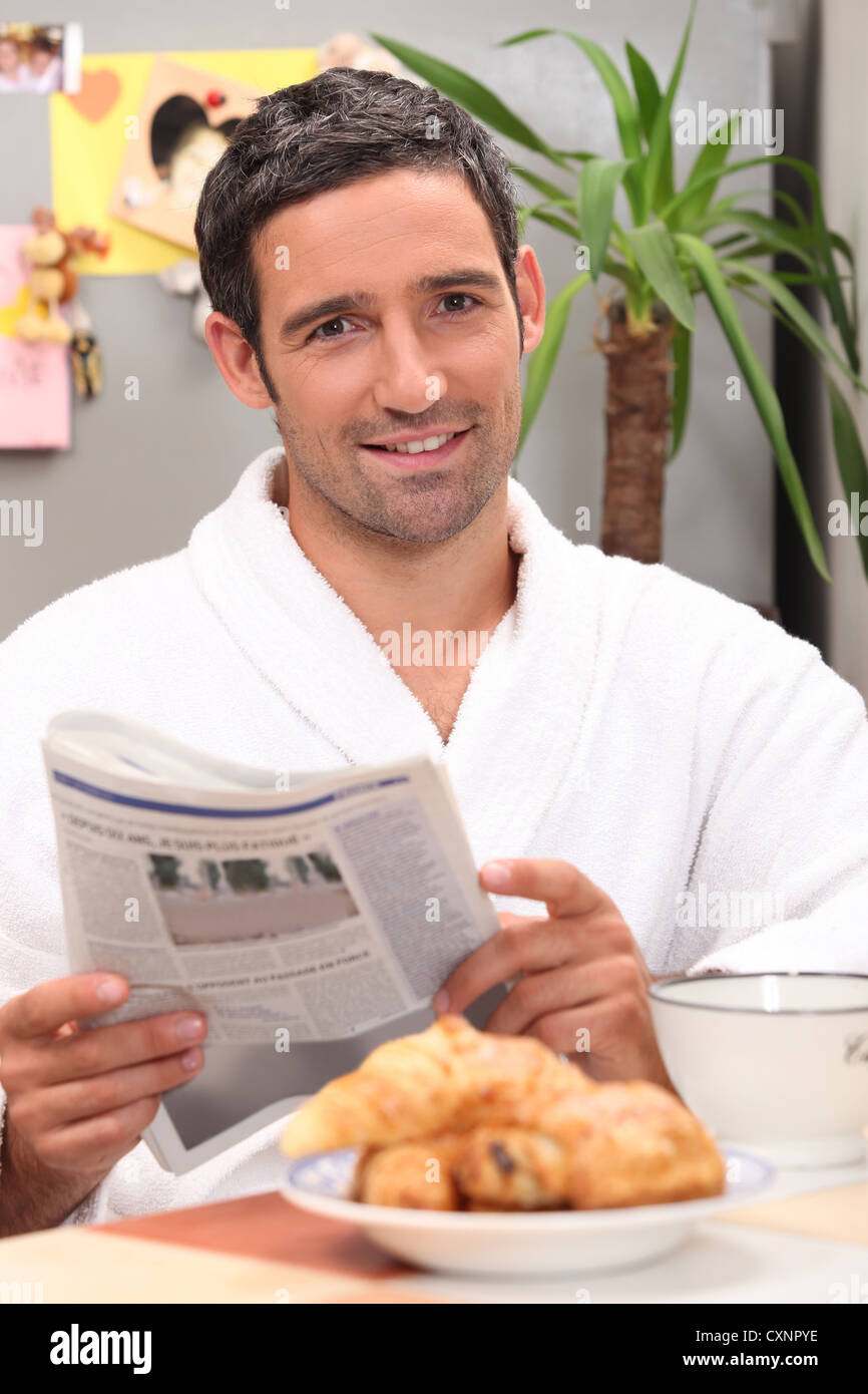 Breakfast with the newspaper Stock Photo - Alamy