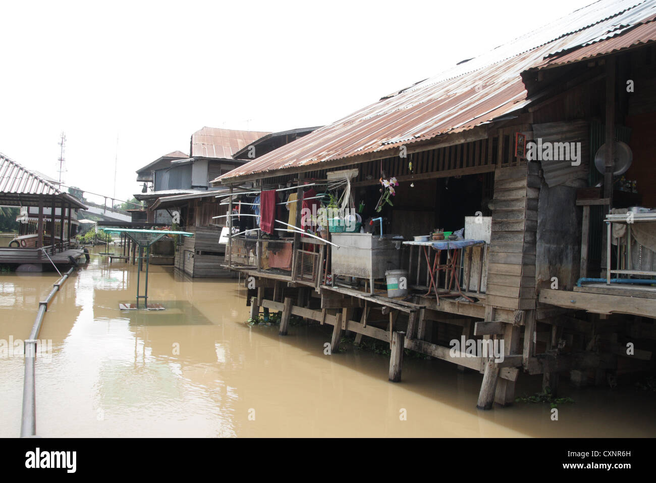 Thai wooden house along river , Suphanburi , Thailand Stock Photo - Alamy