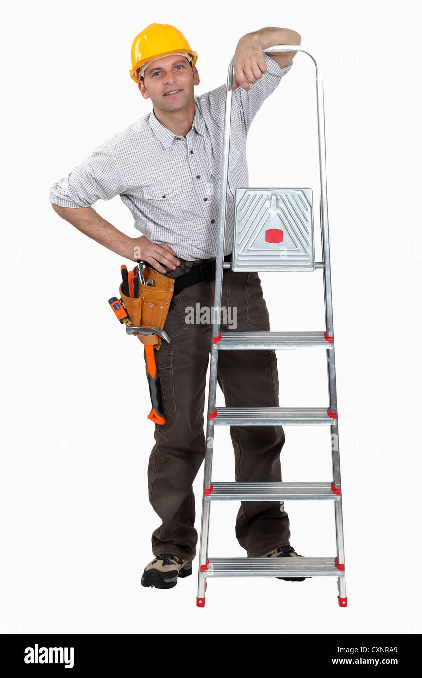 A handyman with a ladder Stock Photo - Alamy