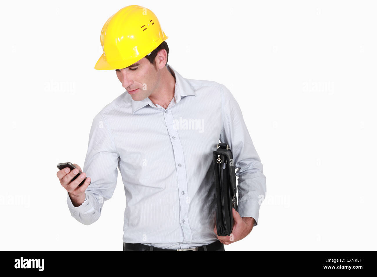Architect with a briefcase and phone Stock Photo - Alamy