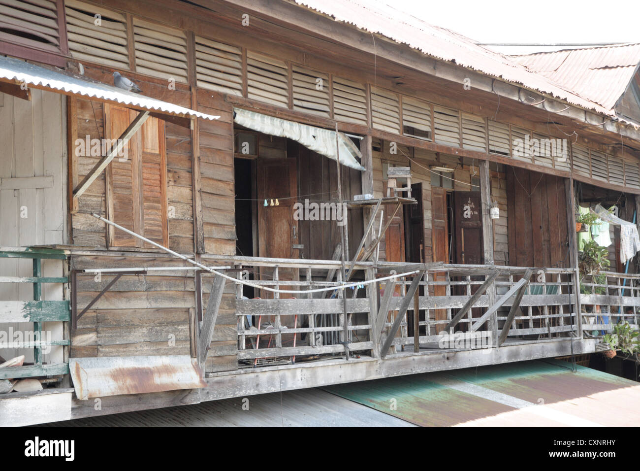 Thai wooden house along river , Suphanburi , Thailand Stock Photo - Alamy