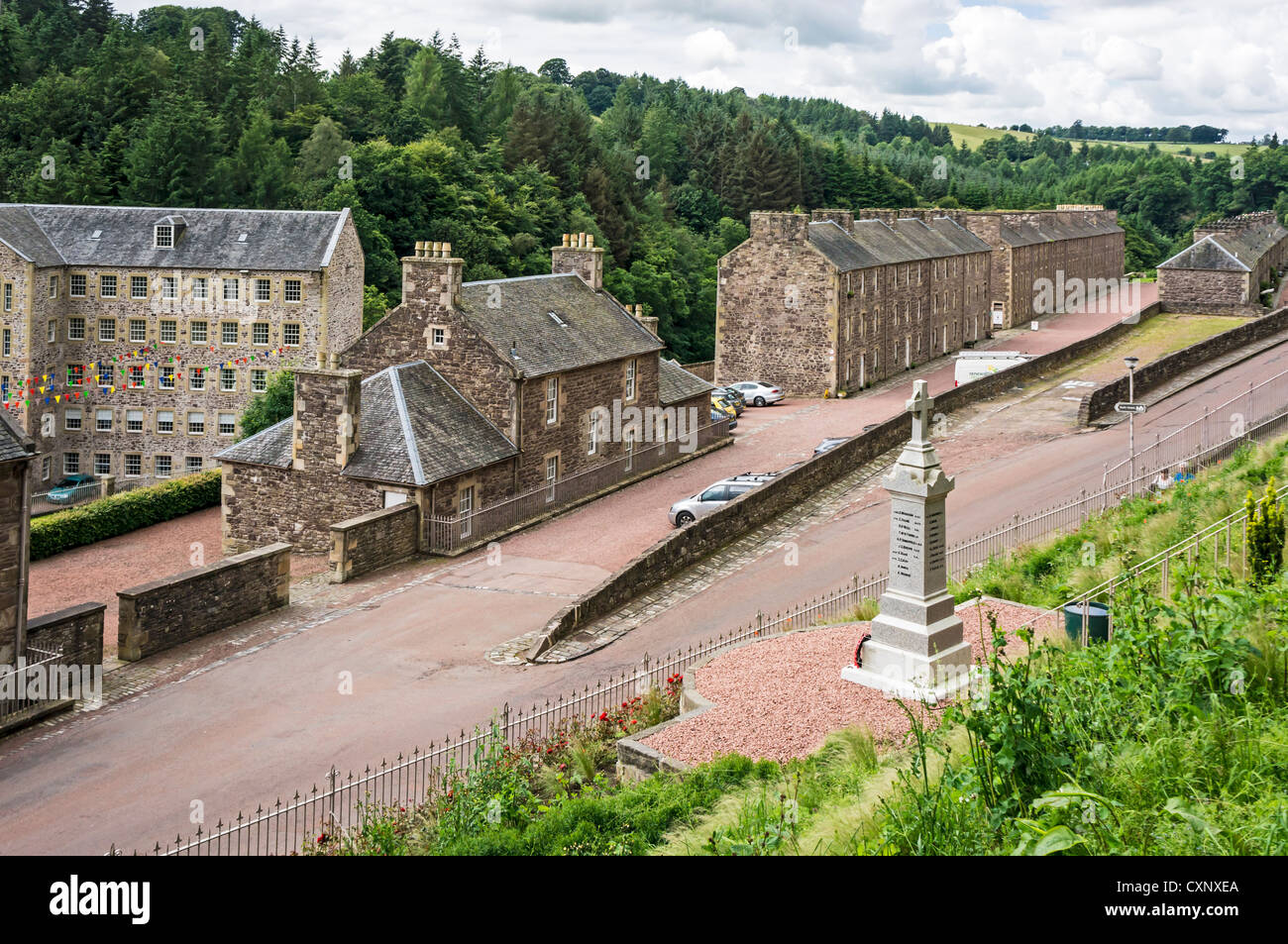 View of New Lanark Heritage Site with war memorial and New Lanark Mill ...