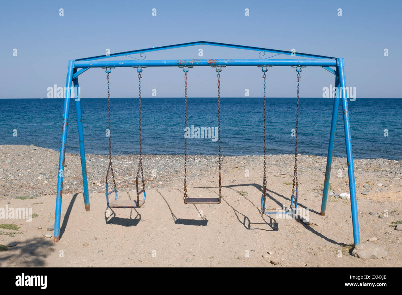 Swings in row hi-res stock photography and images - Alamy