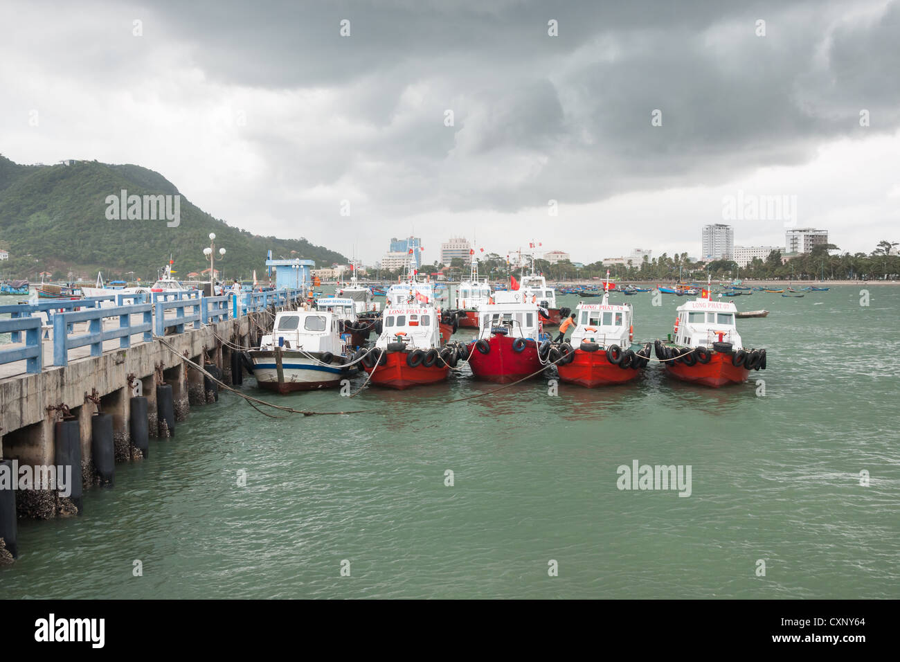 Vietnamese Boats at the Jetty Stock Photo - Alamy