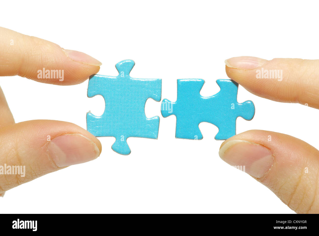 puzzle in hand isolated on white background Stock Photo - Alamy
