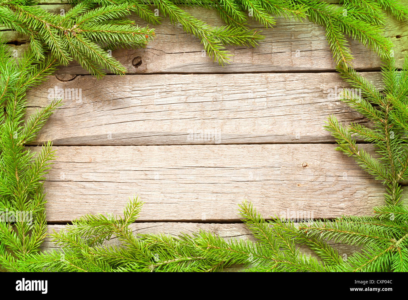 Christmas background border with fir on wooden boards Stock Photo - Alamy