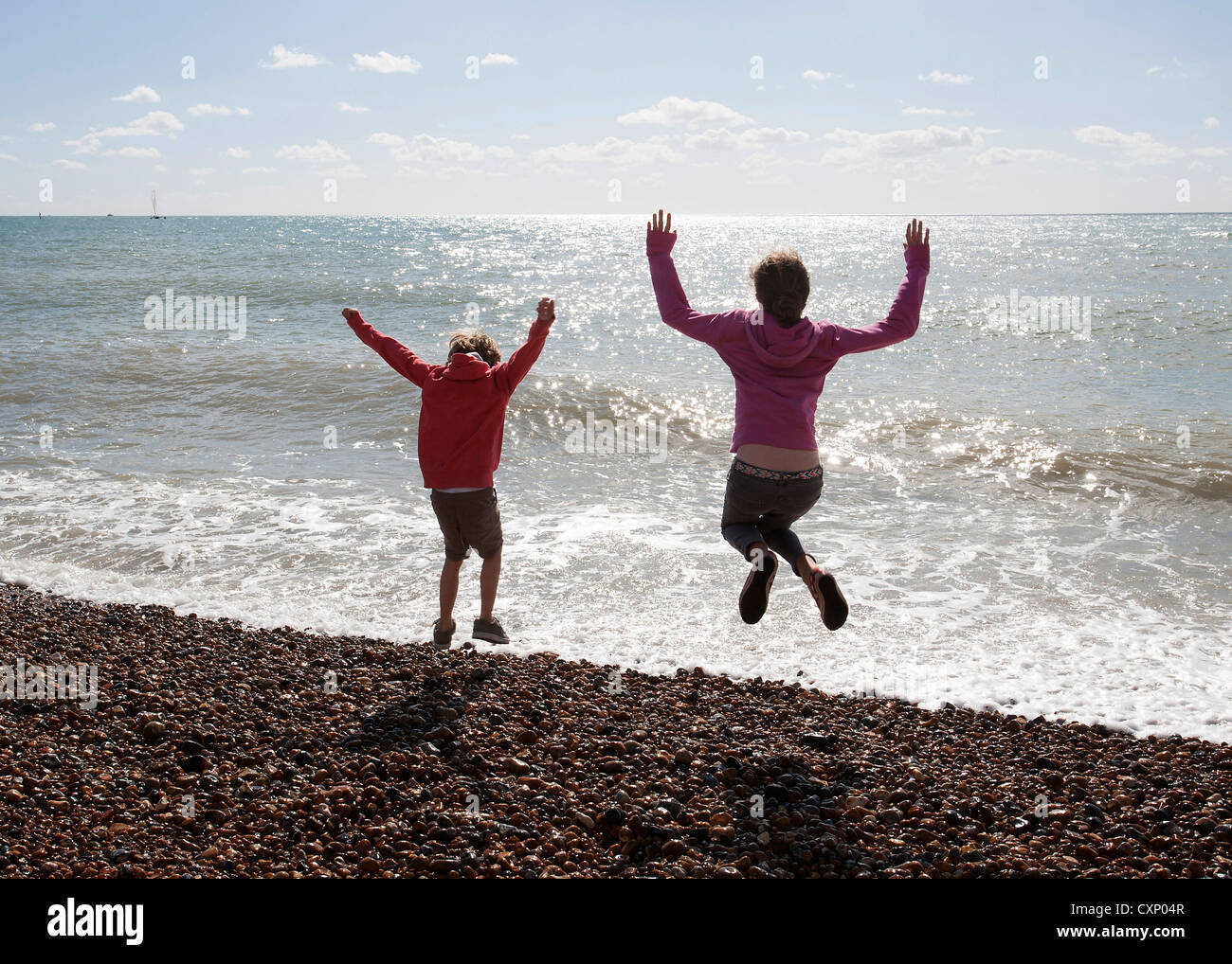 Children jumping for joy hi-res stock photography and images - Alamy
