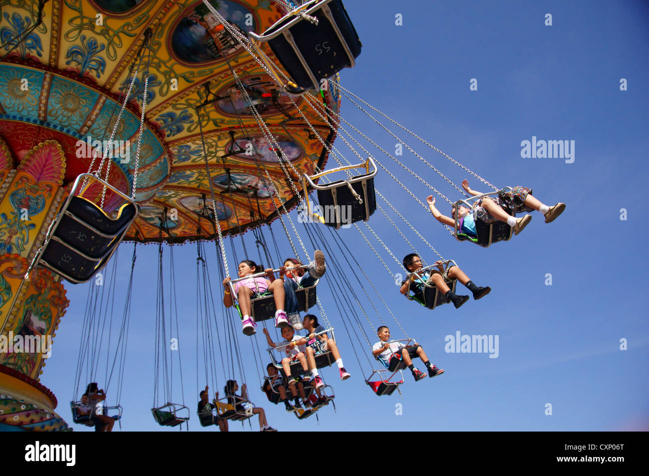Fairground Ride Chair Planes People Stock Photos & Fairground Ride ...