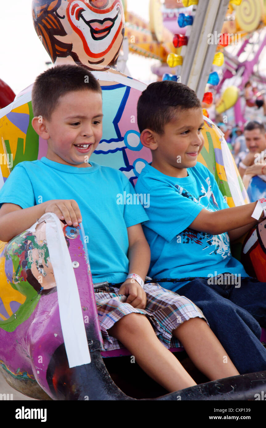 boys on carnival ride children kids child kid siblings midway new ...