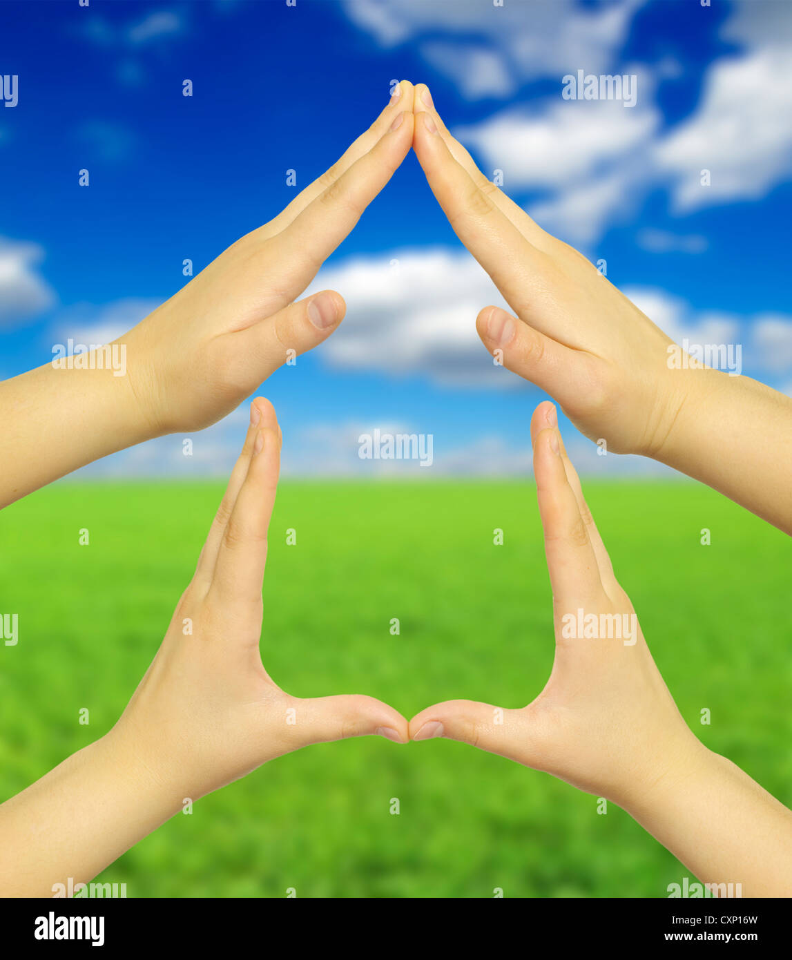 House made of woman hands isolated on field Stock Photo - Alamy