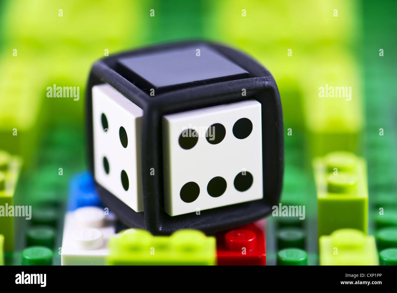 Detail of plastic dice on game board Stock Photo - Alamy
