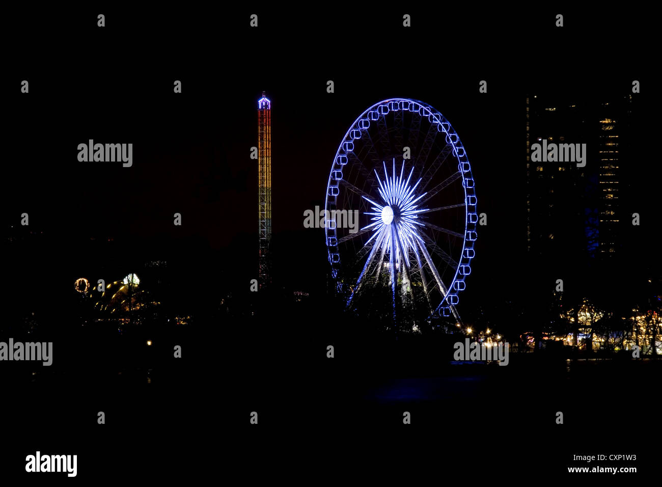 A distant view of two of the fairground rides in the 'Winter Wonderland ...