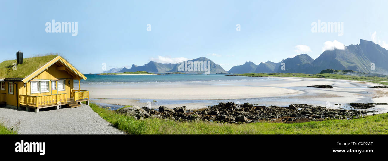 a yellow summer cottage on the beach on the Lofoten Stock Photo - Alamy