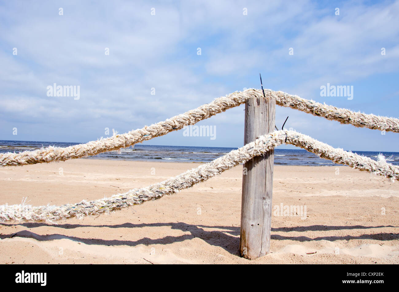 old ropes fence on resort beach near sea Stock Photo - Alamy