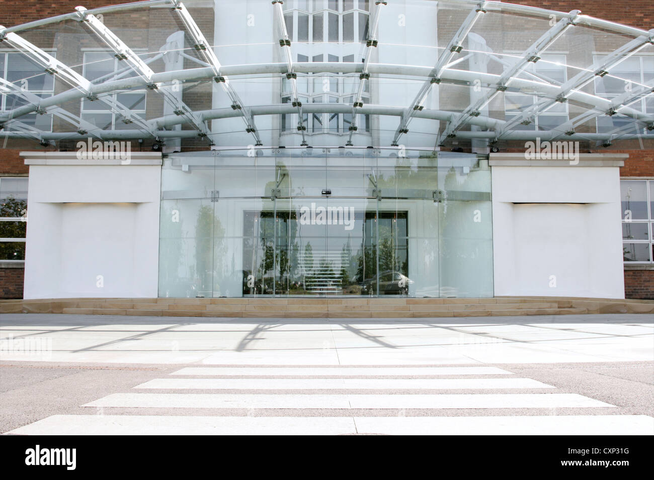 Front entrance to corporate building Stock Photo - Alamy