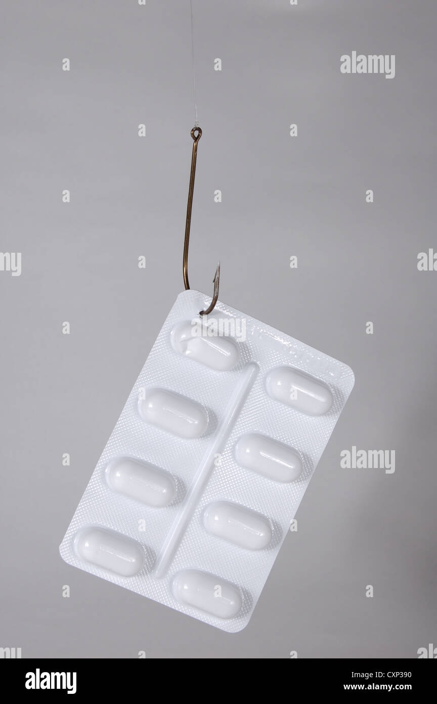 Drug packet on a fishing hook against a grey background Stock Photo - Alamy