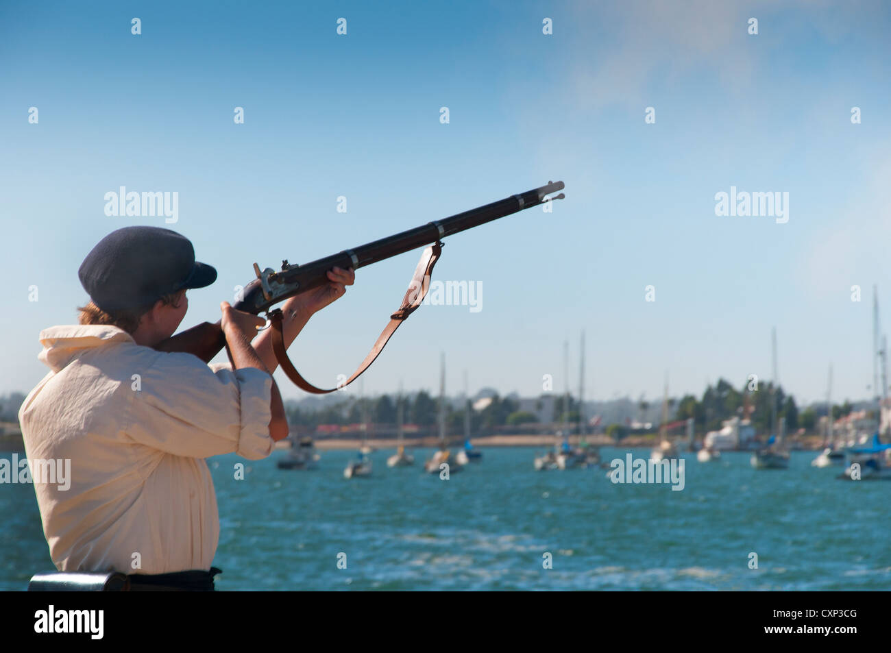 Gunner Firing Musket in festival of Tall Sailing Ships in Harbour of ...