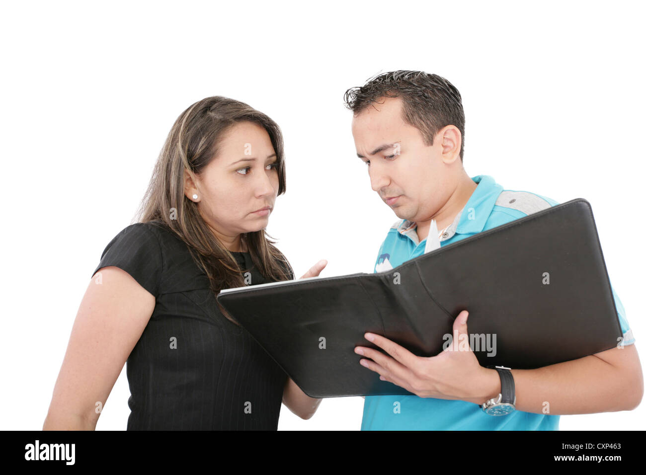 Young beautiful business woman with her employee reading document Stock ...