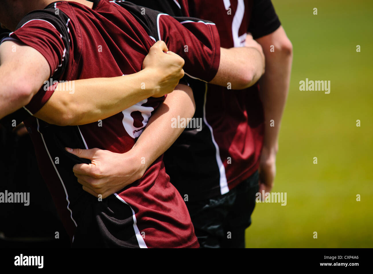 Arm around player hi-res stock photography and images - Alamy