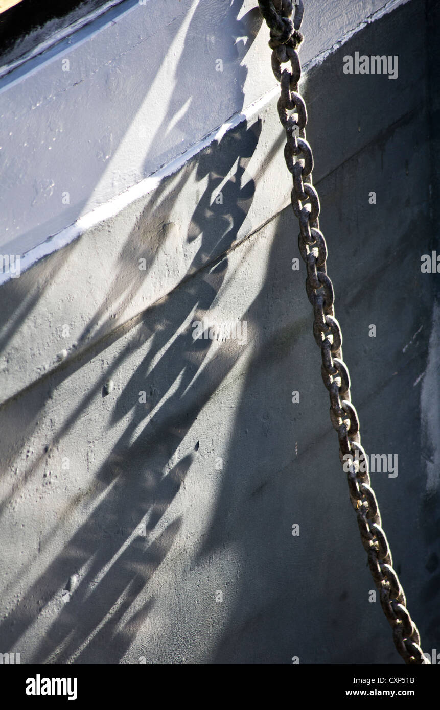 Shadow of a chain on a barge hull, Maldon, Essex Stock Photo - Alamy