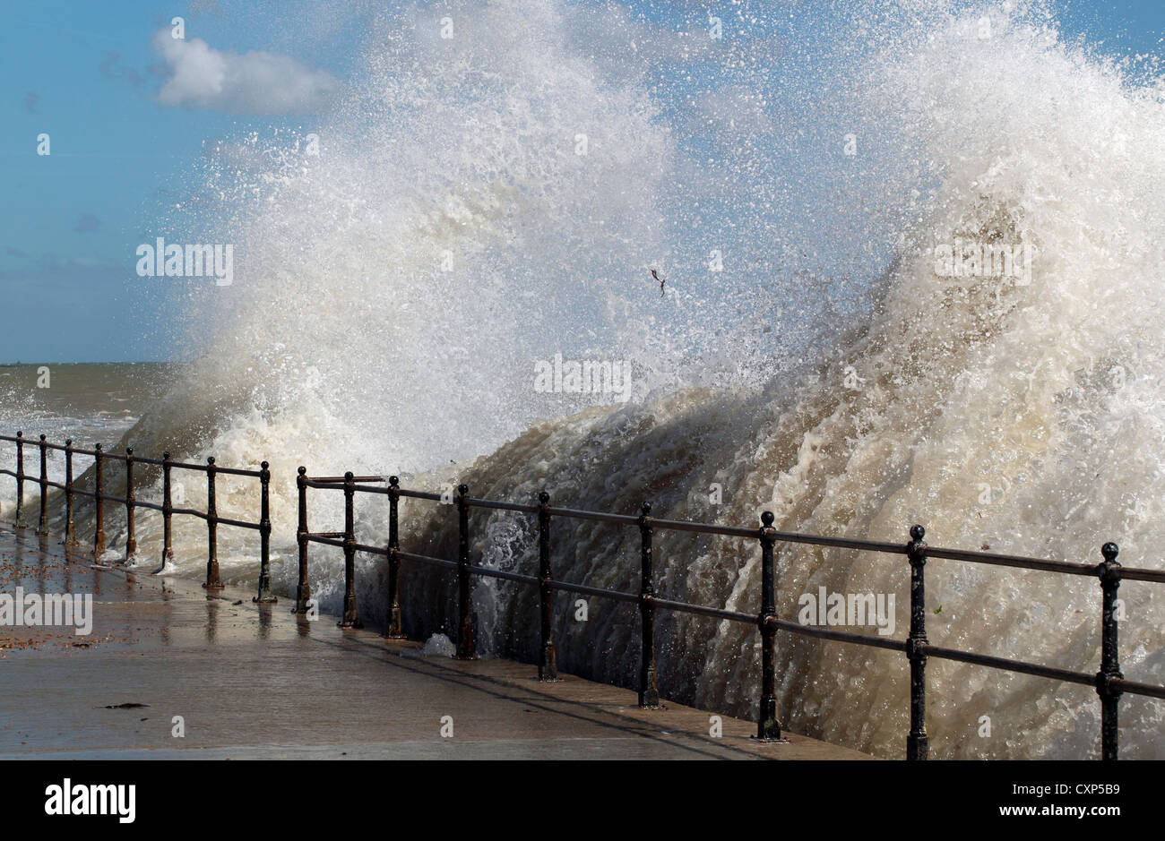 Dramatic waves sending up large plumes of sea spray as they crash ...