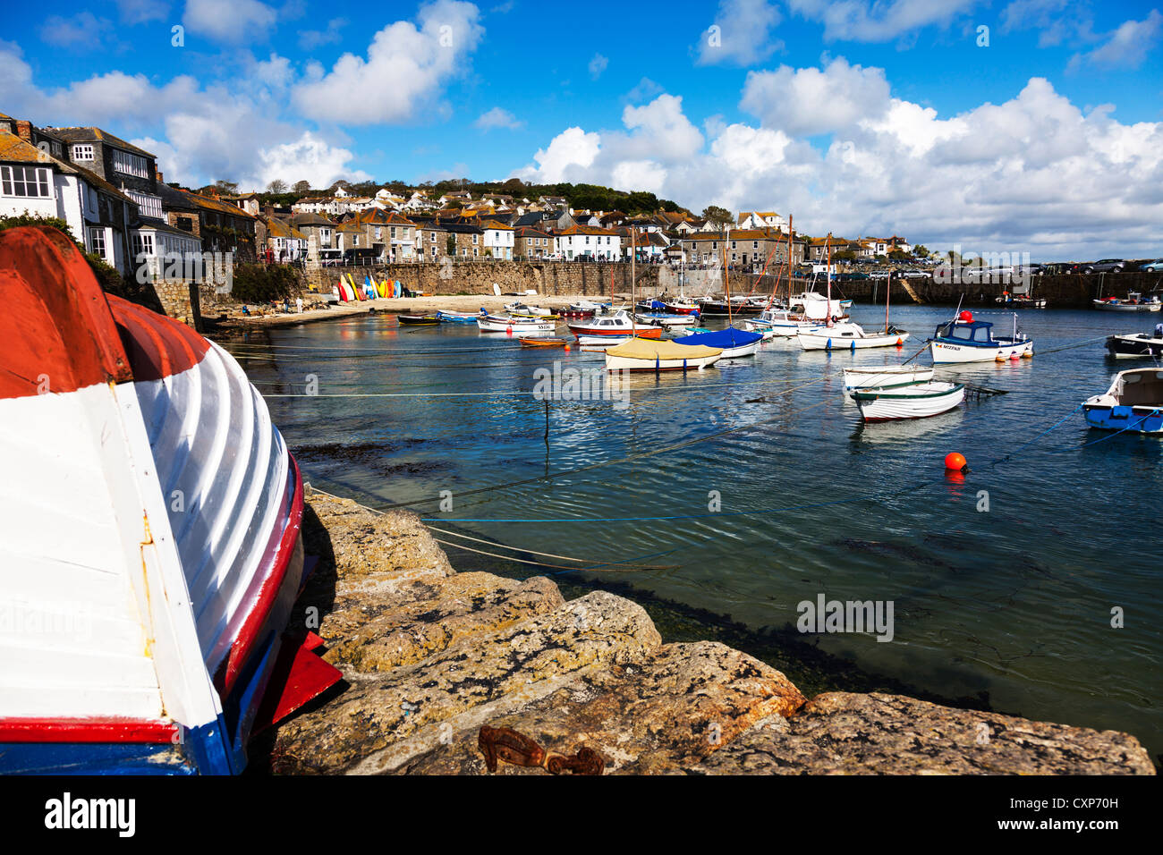 Mousehole harbor harbour Cornwall small fishing boats moored with ...