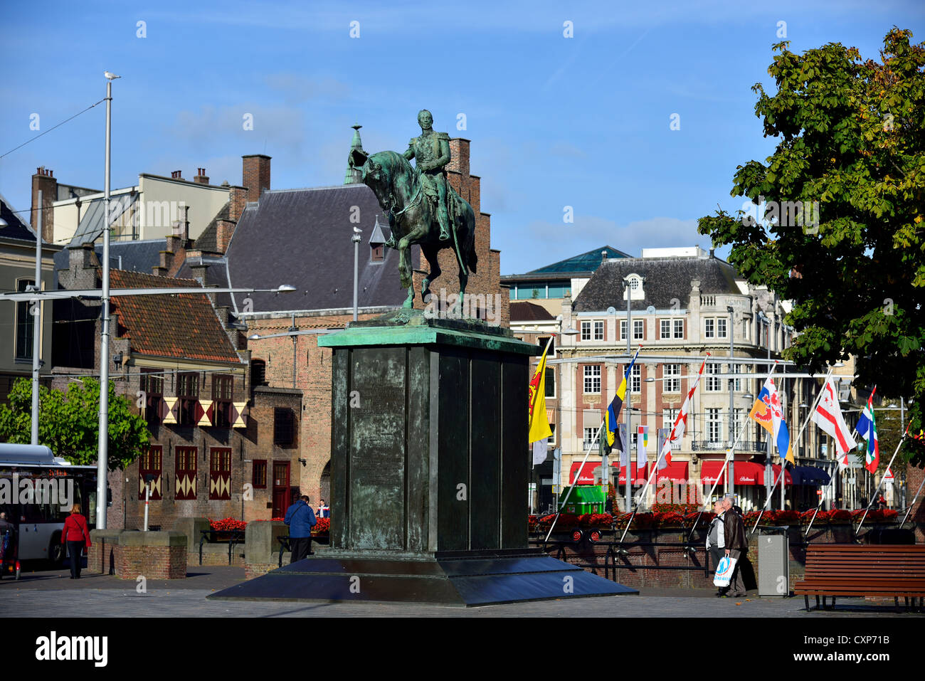 A bronze statue of King Willem II on the street of the Hague ...