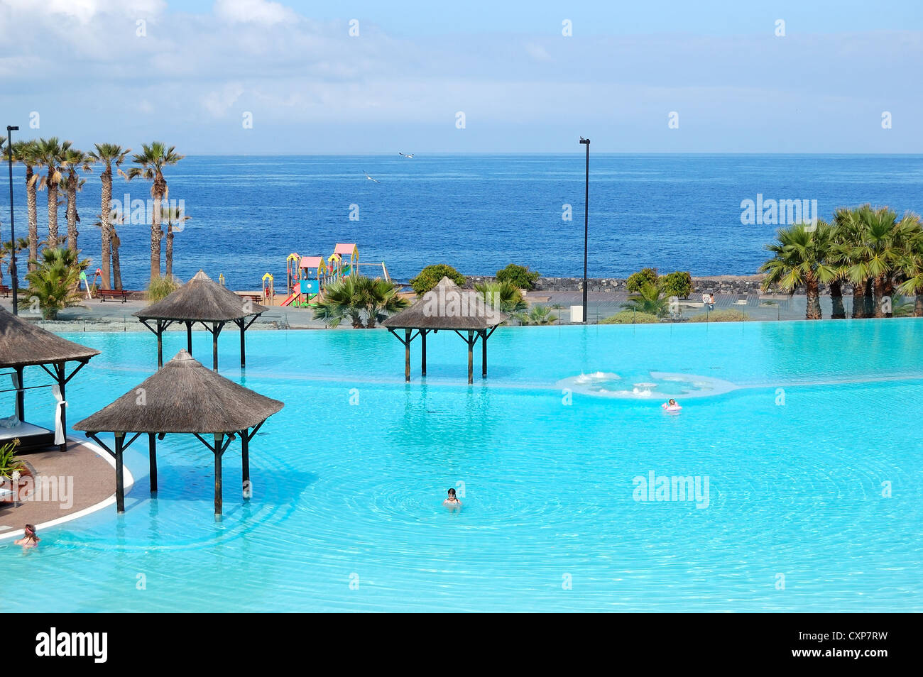 Swimming pool with jacuzzi and beach of luxury hotel, Tenerife island ...